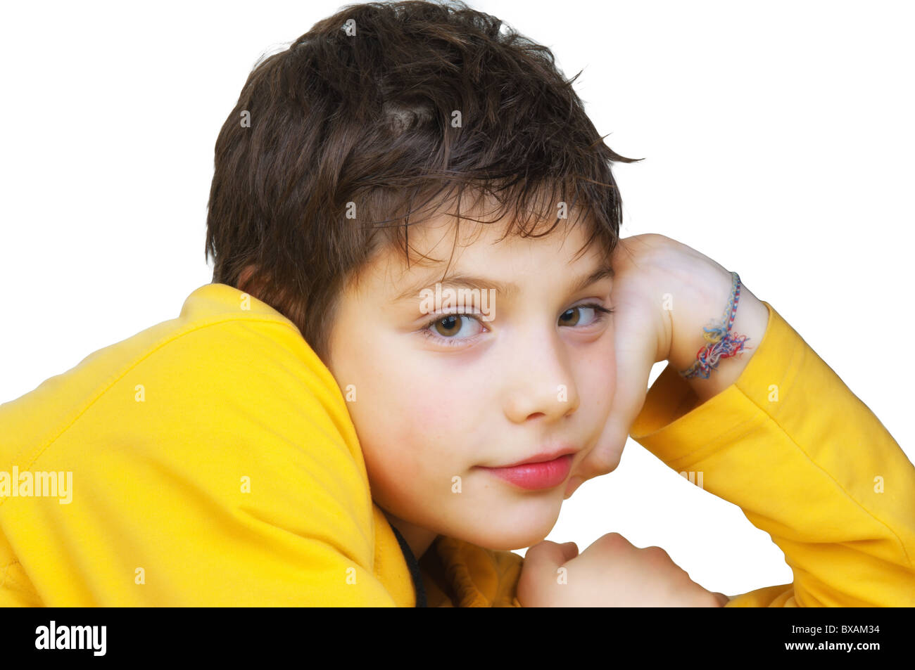 The white boy lies having leant against a hand on a white background ...