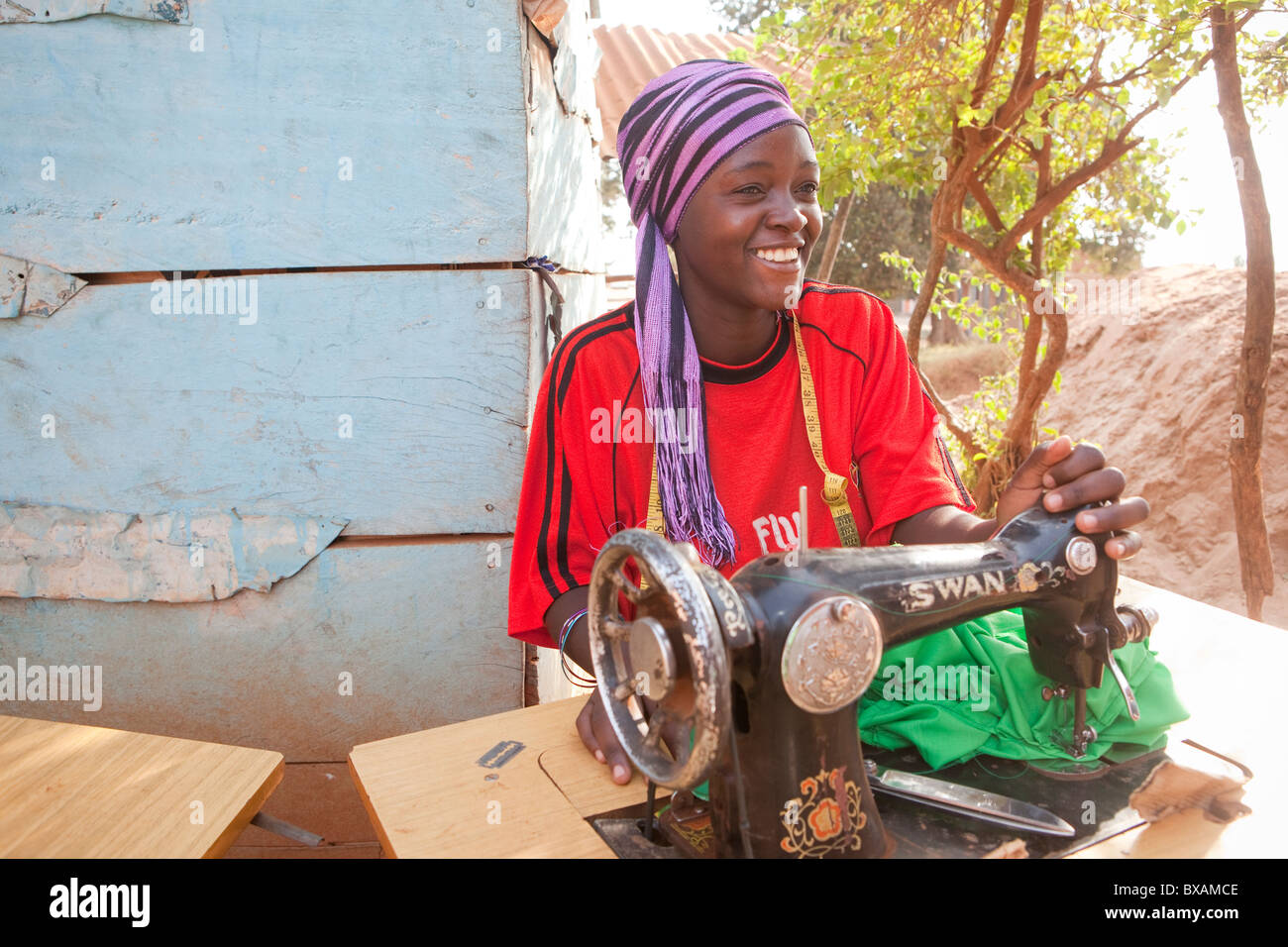 African village woman sewing hi-res stock photography and images - Alamy