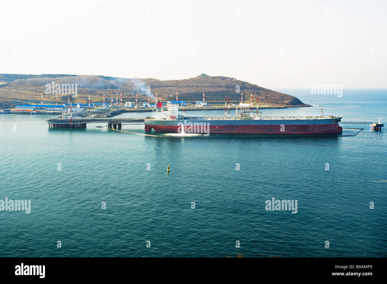 Loading of the sea tanker by petroleum crude on a bulk-oil mooring ...