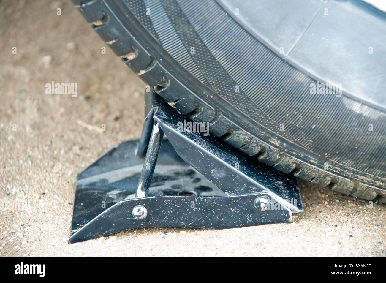 Brake emphasis under a wheel of the standing car Stock Photo - Alamy