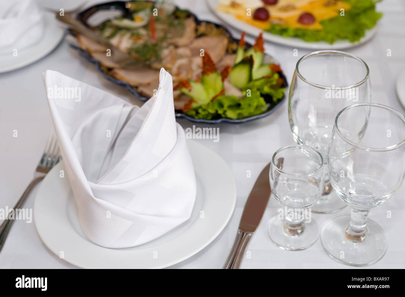 served dinner for one person at laid restaurant banquet table Stock ...