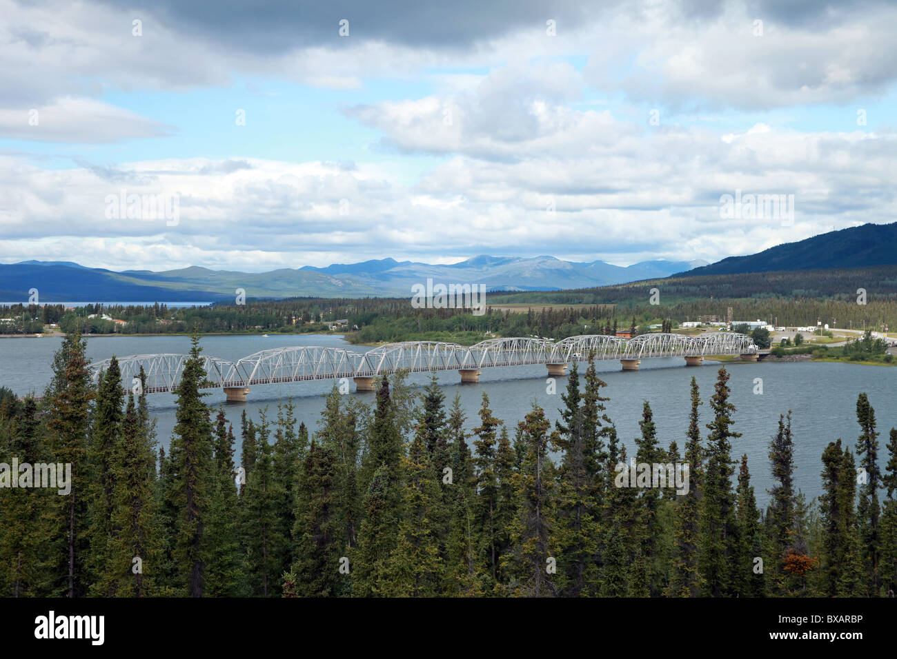 Bridge over the Teslin River in Canada, with beautiful mountains and ...