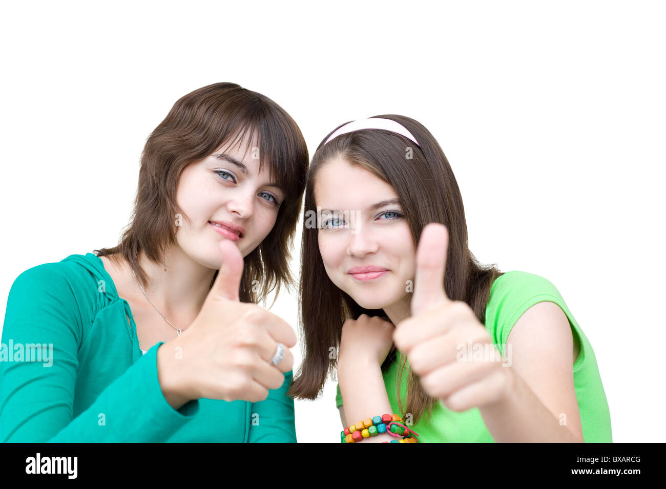 young beautiful smiling european girls look into camera and show their ...