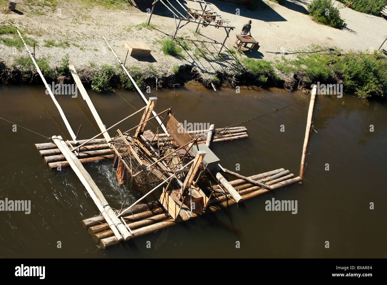 A fish wheel on the Chena river at a fishing village in Alaska Stock ...