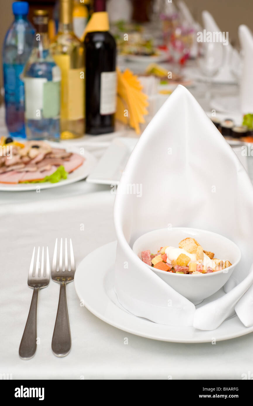 served dinner for one person at laid restaurant banquet table Stock ...