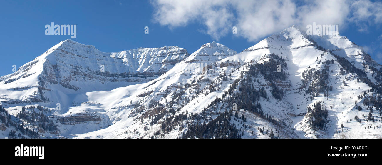 The summit, ridge, of Mount Timpanogos, Utah with snow and a blue ...