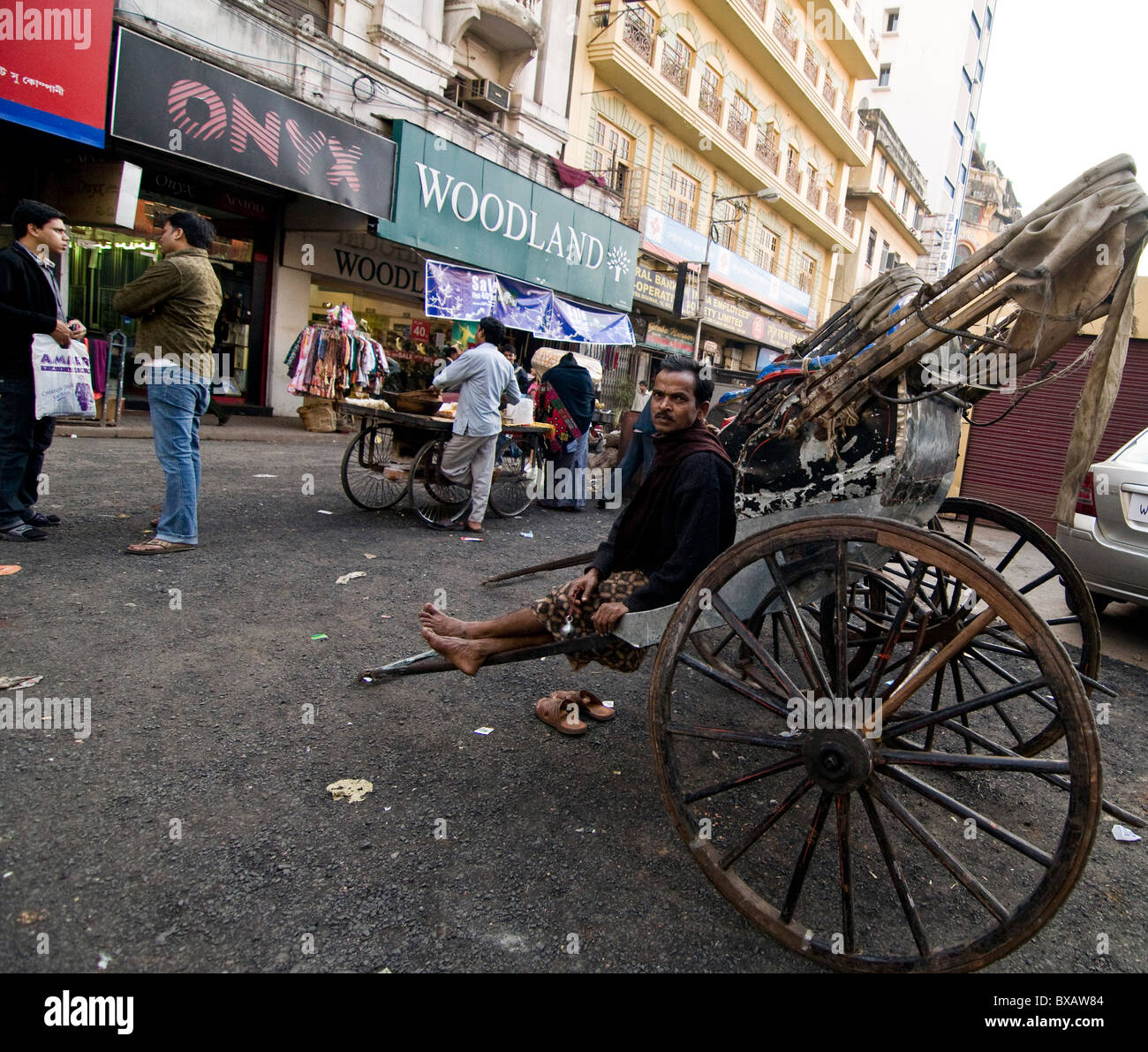 Hand pulled rickshaws are still in use in the streets of Kolkata Stock ...
