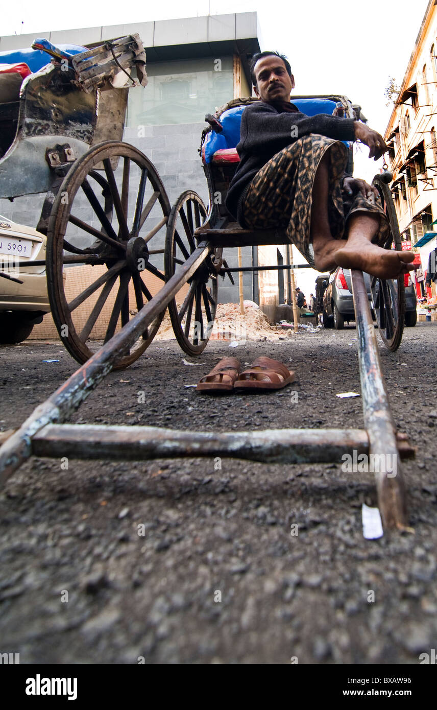 Hand pulled rickshaws are still in use in the streets of Kolkata Stock ...