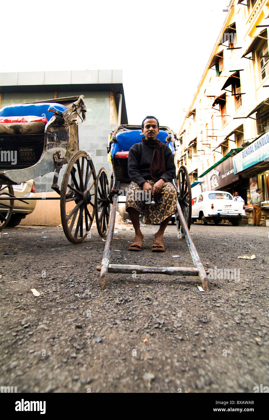 Hand pulled rickshaws are still in use in the streets of Kolkata Stock ...