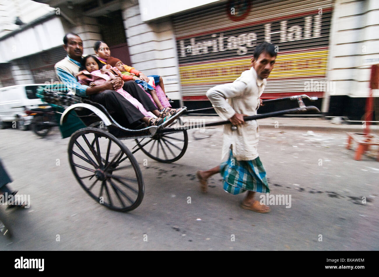 Hand pulled rickshaws are still in use in the streets of Kolkata Stock ...
