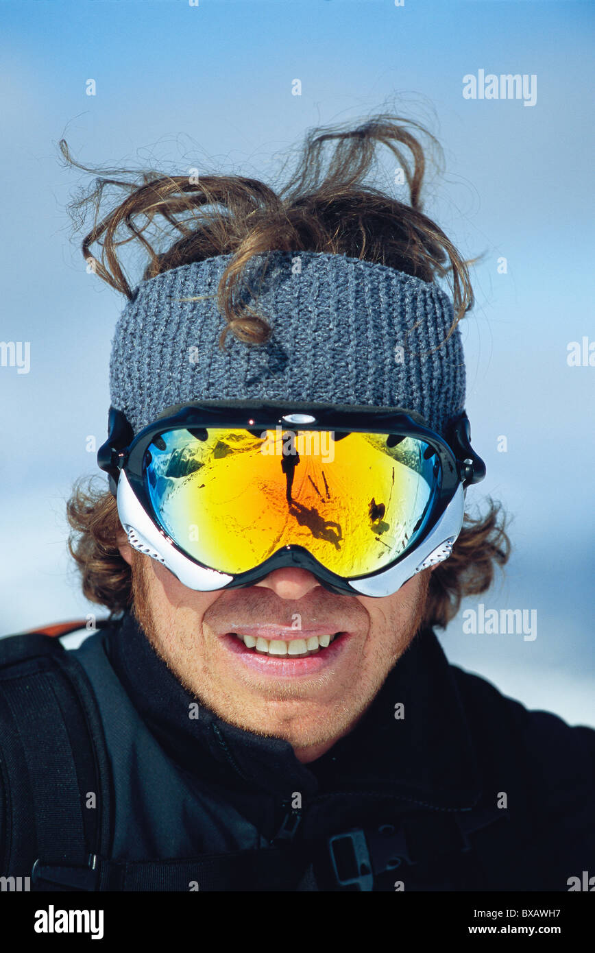 Portrait of man wearing ski goggles Stock Photo - Alamy