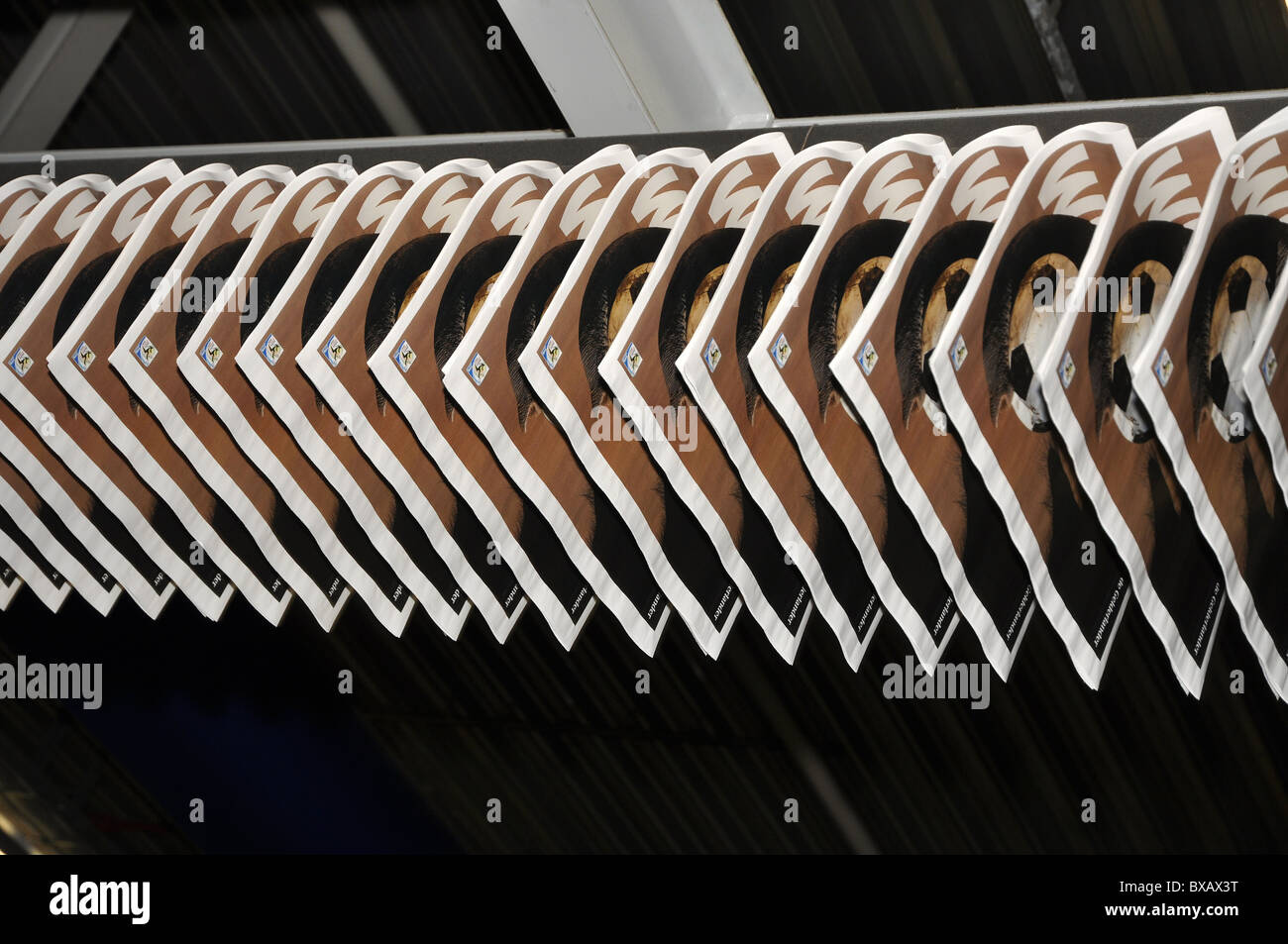 Newspaper coming out of automated print process Stock Photo - Alamy