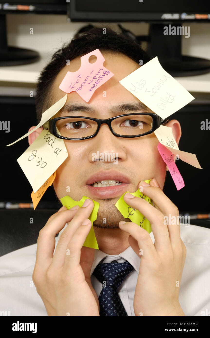 Adhesive notes stuck on a businessman's face Stock Photo - Alamy