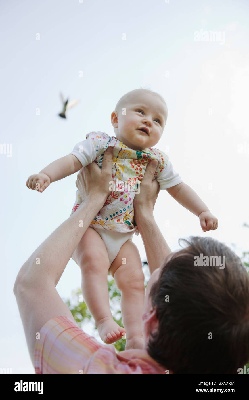 Lifted child hi-res stock photography and images - Alamy