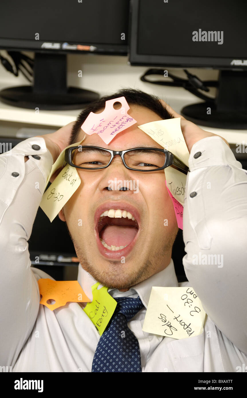 Adhesive notes stuck on a businessman's face Stock Photo - Alamy