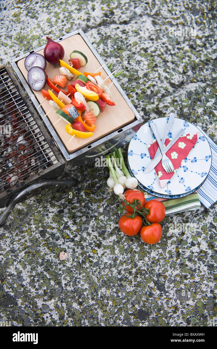 Vegetables on grill with plates Stock Photo - Alamy