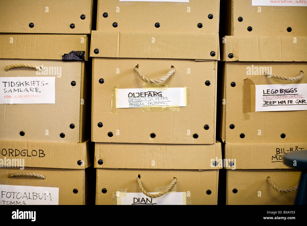 Stack of cardboard boxes with different labels Stock Photo - Alamy