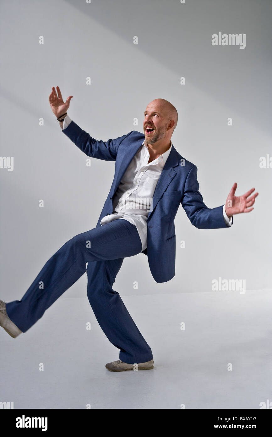 Mature man dancing, smiling Stock Photo - Alamy