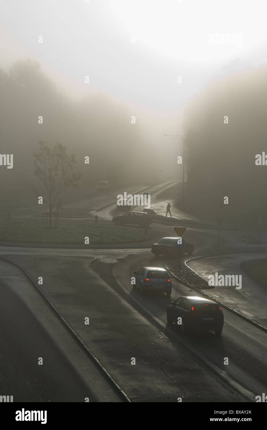 Traffic in morning fog Stock Photo - Alamy