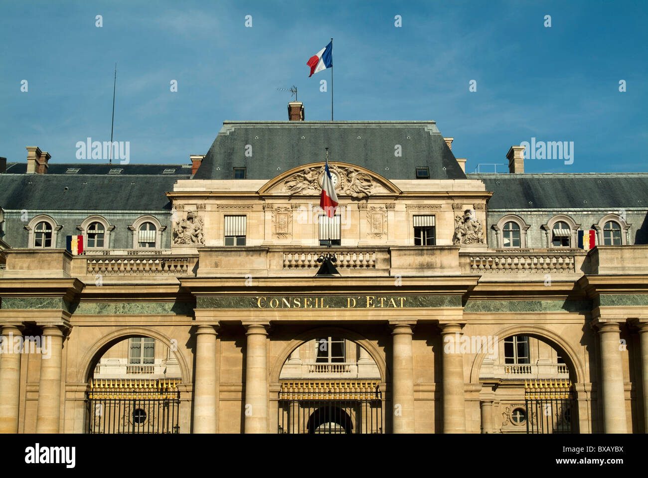 French flags flying outside the Conseil d'Etat, a government building ...