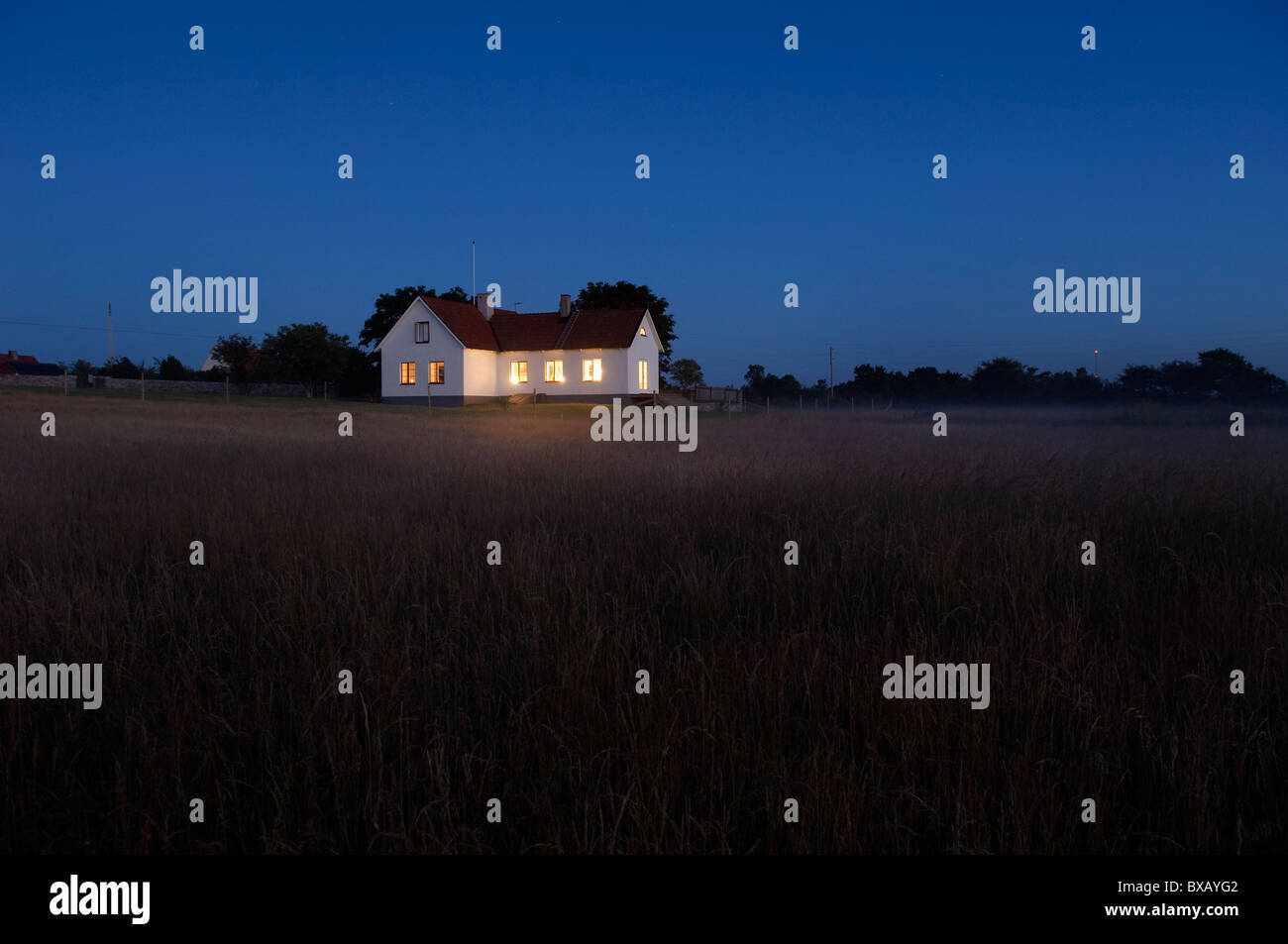 Farmhouse at dusk Stock Photo - Alamy