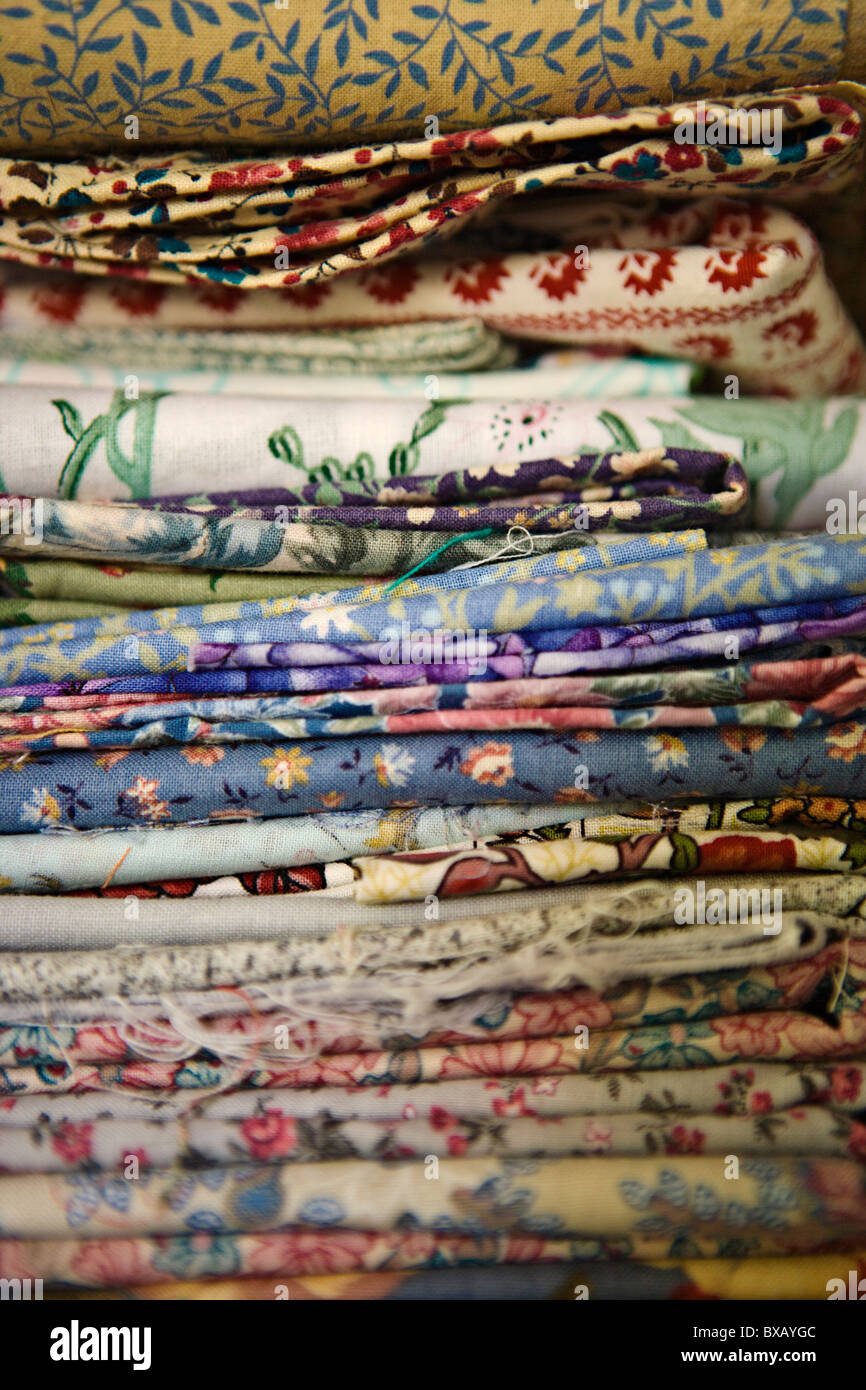 Stack of fabrics with floral patterns Stock Photo - Alamy