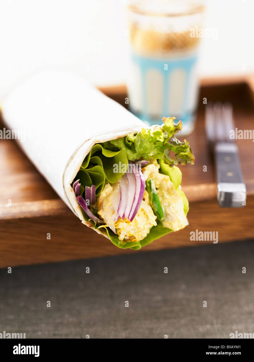 Close-up of roll with leaf vegetable Stock Photo - Alamy