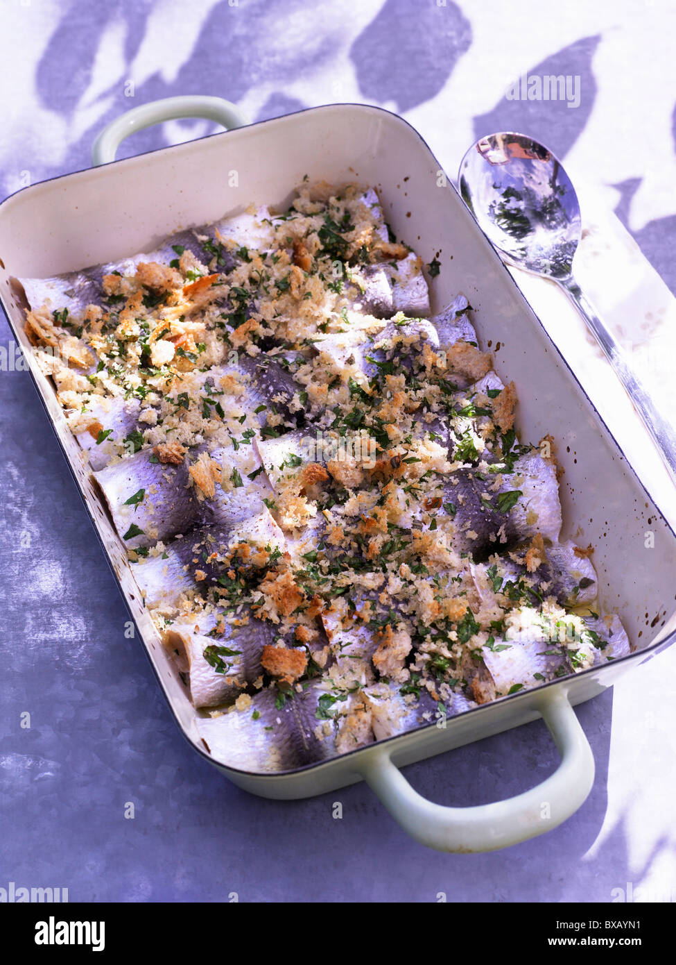 Fish with garnish served on tray Stock Photo - Alamy