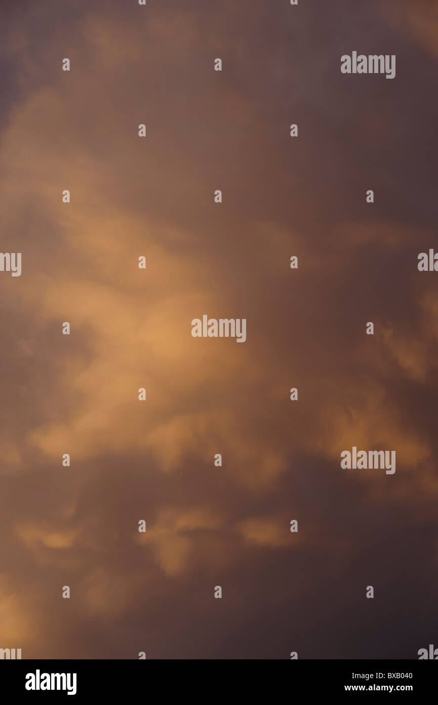 Clouds in sunset sky Stock Photo - Alamy