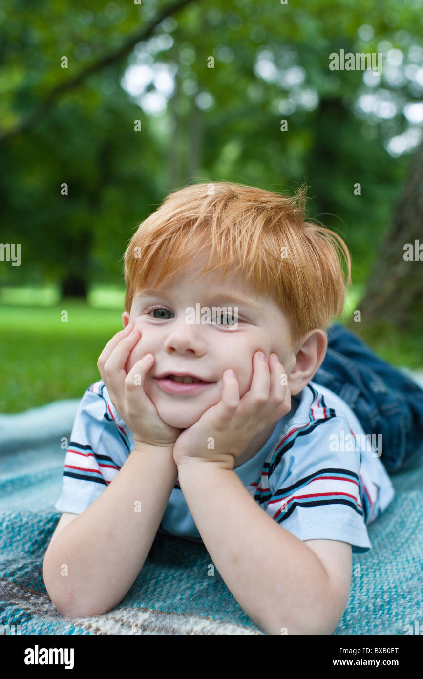 Preschooler boy lies in hi-res stock photography and images - Alamy