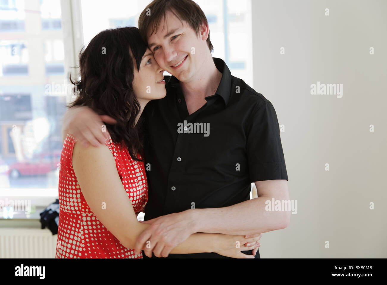 Couple hugging each other Stock Photo - Alamy