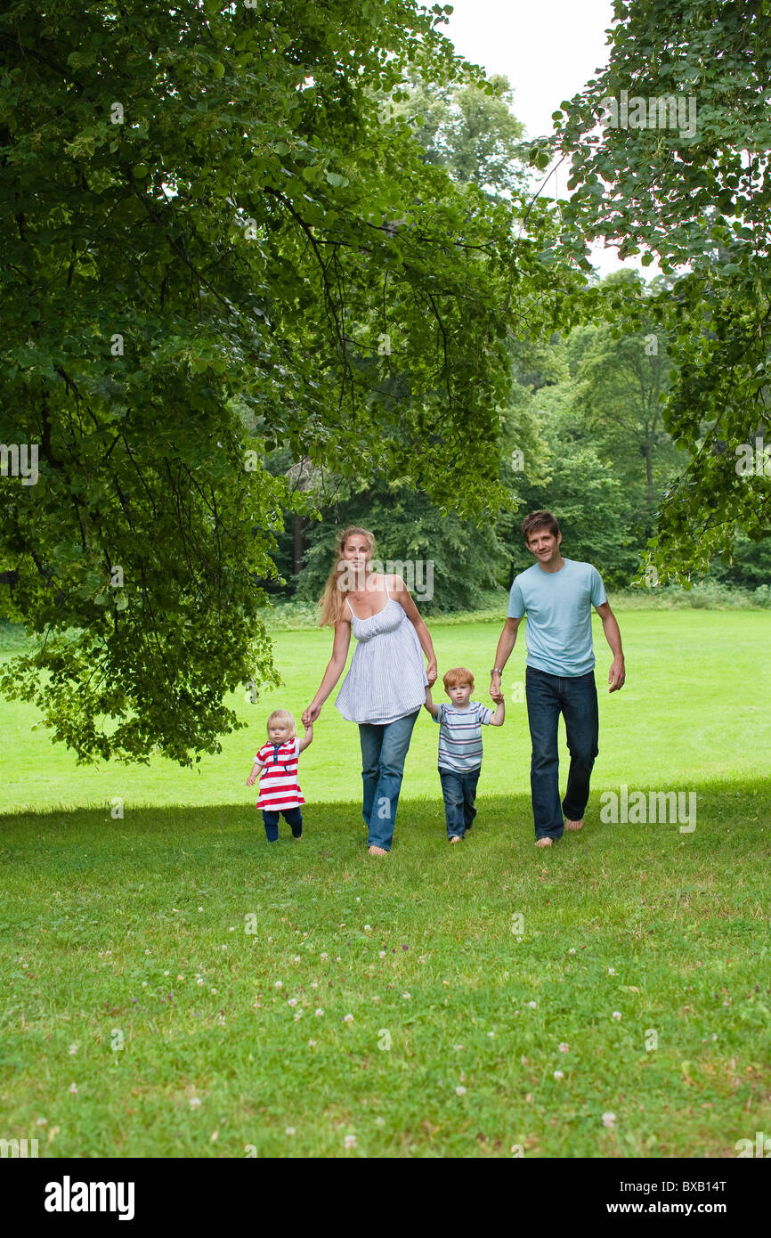 Child holding adults hand walking hi-res stock photography and images ...