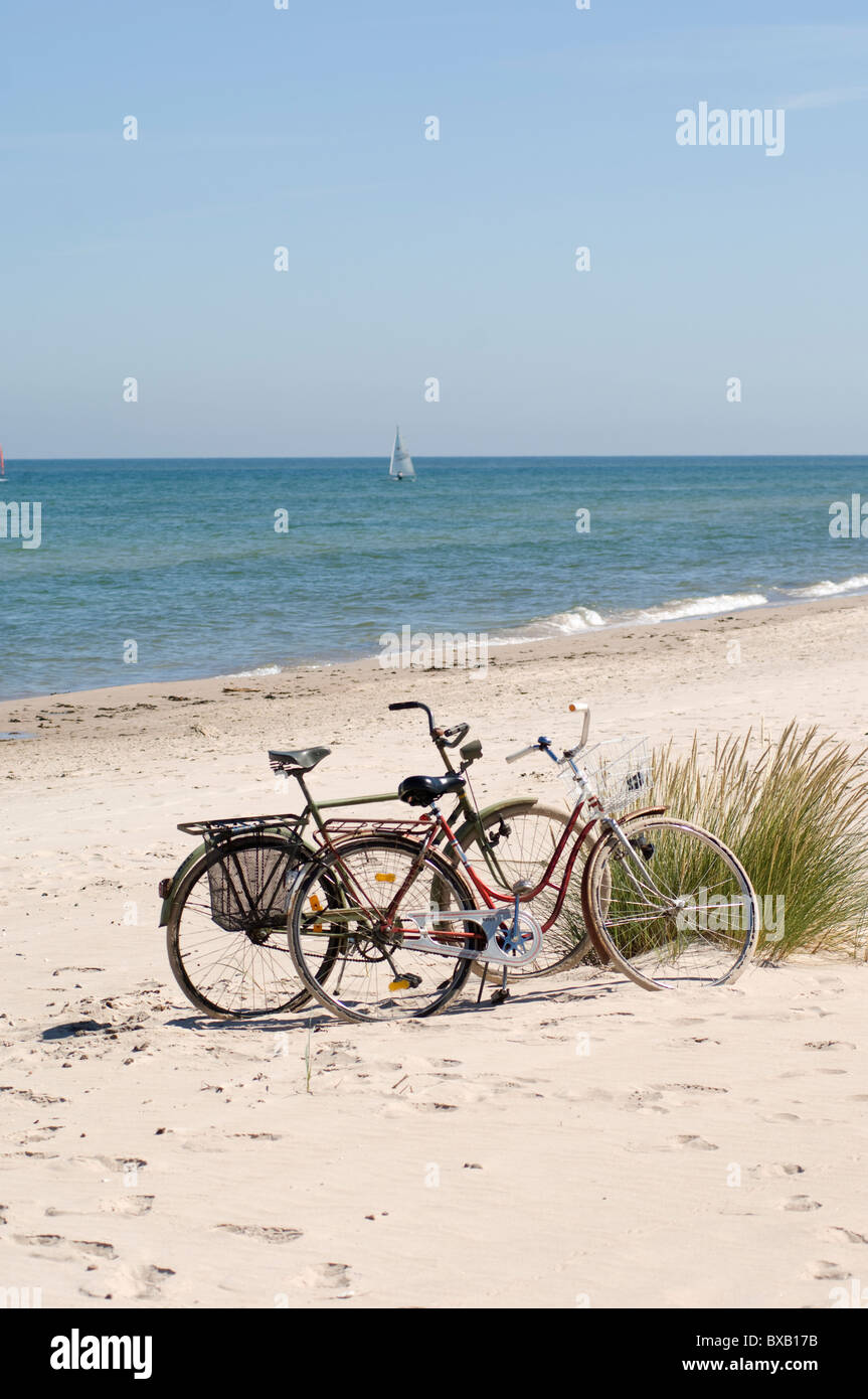 Two bikes on beach Stock Photo - Alamy