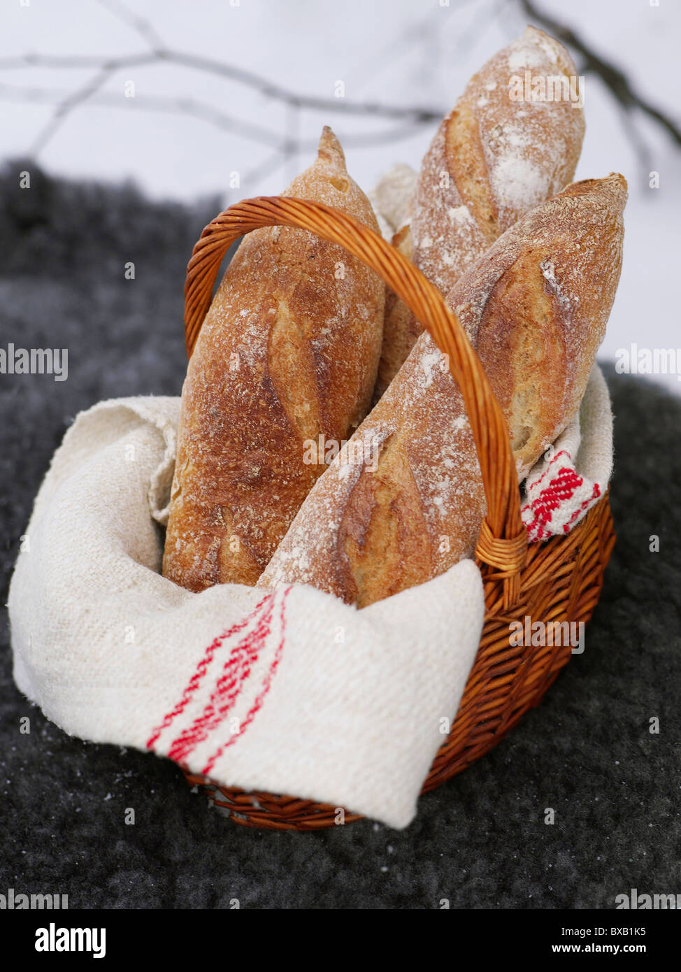 Fresh bread in basket Stock Photo - Alamy