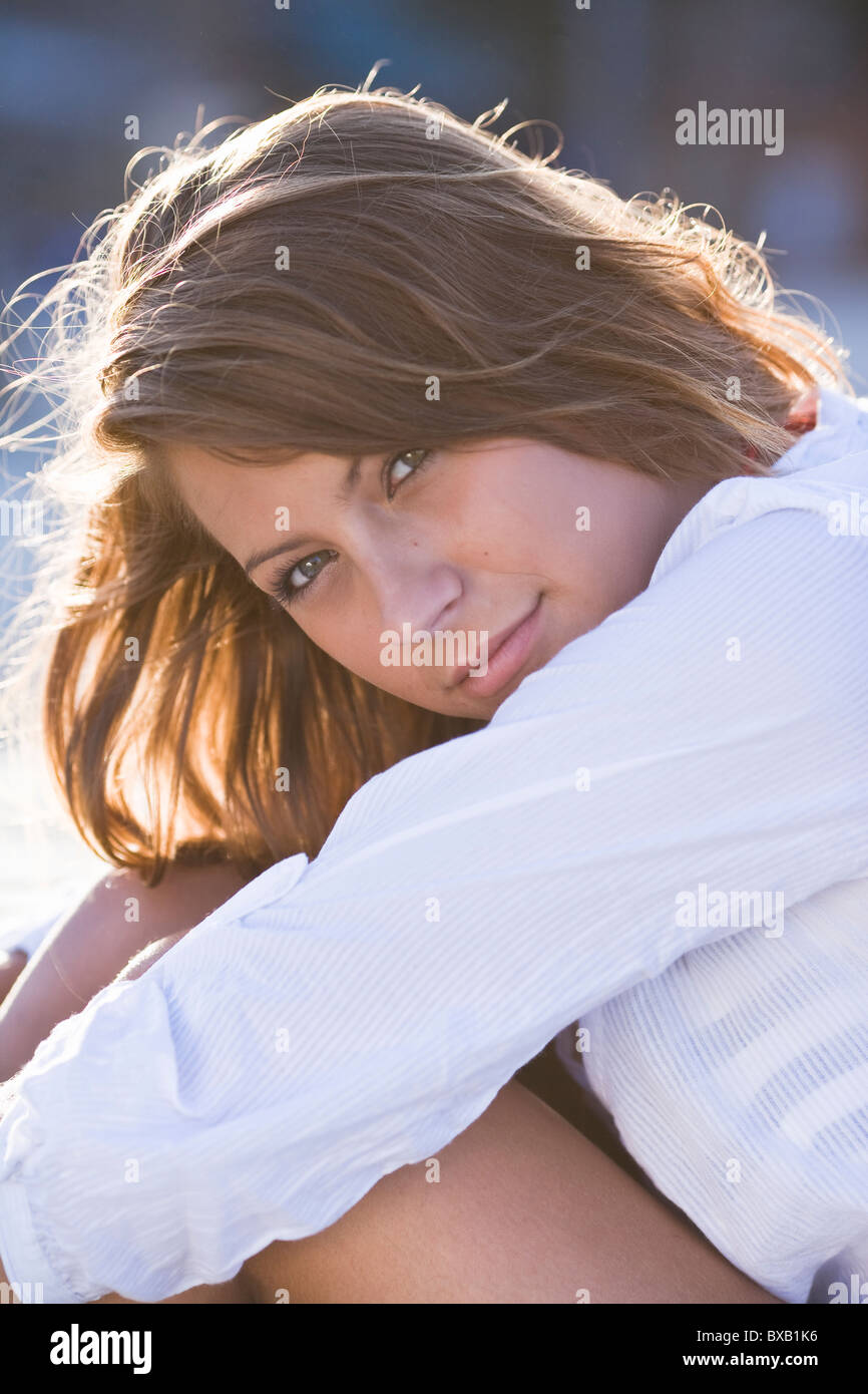 Adult woman dark hair sits hi-res stock photography and images - Alamy