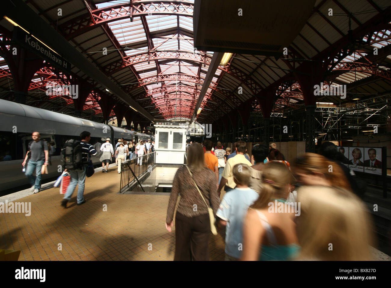 busy passenger in the copenhagen central train station / slow shutter ...