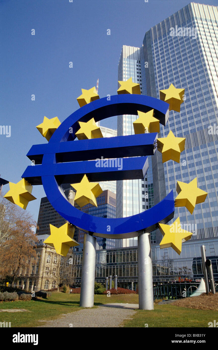 Euro currency symbol, European Central Bank in the back, ECB, Eurotower ...