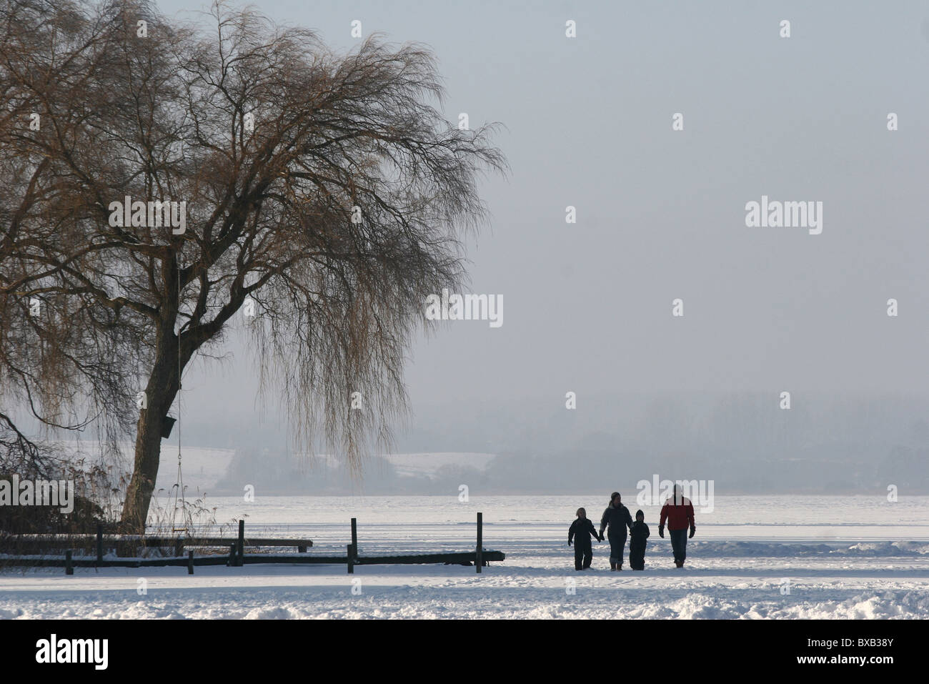 Sjælsø lake in Denmark in winter, people walking on ice Stock Photo - Alamy