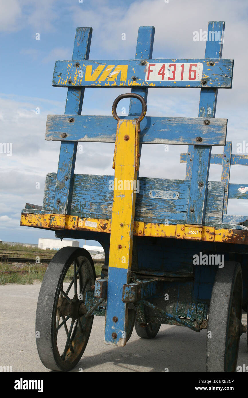 Baggage wagon with steel wheels Stock Photo - Alamy