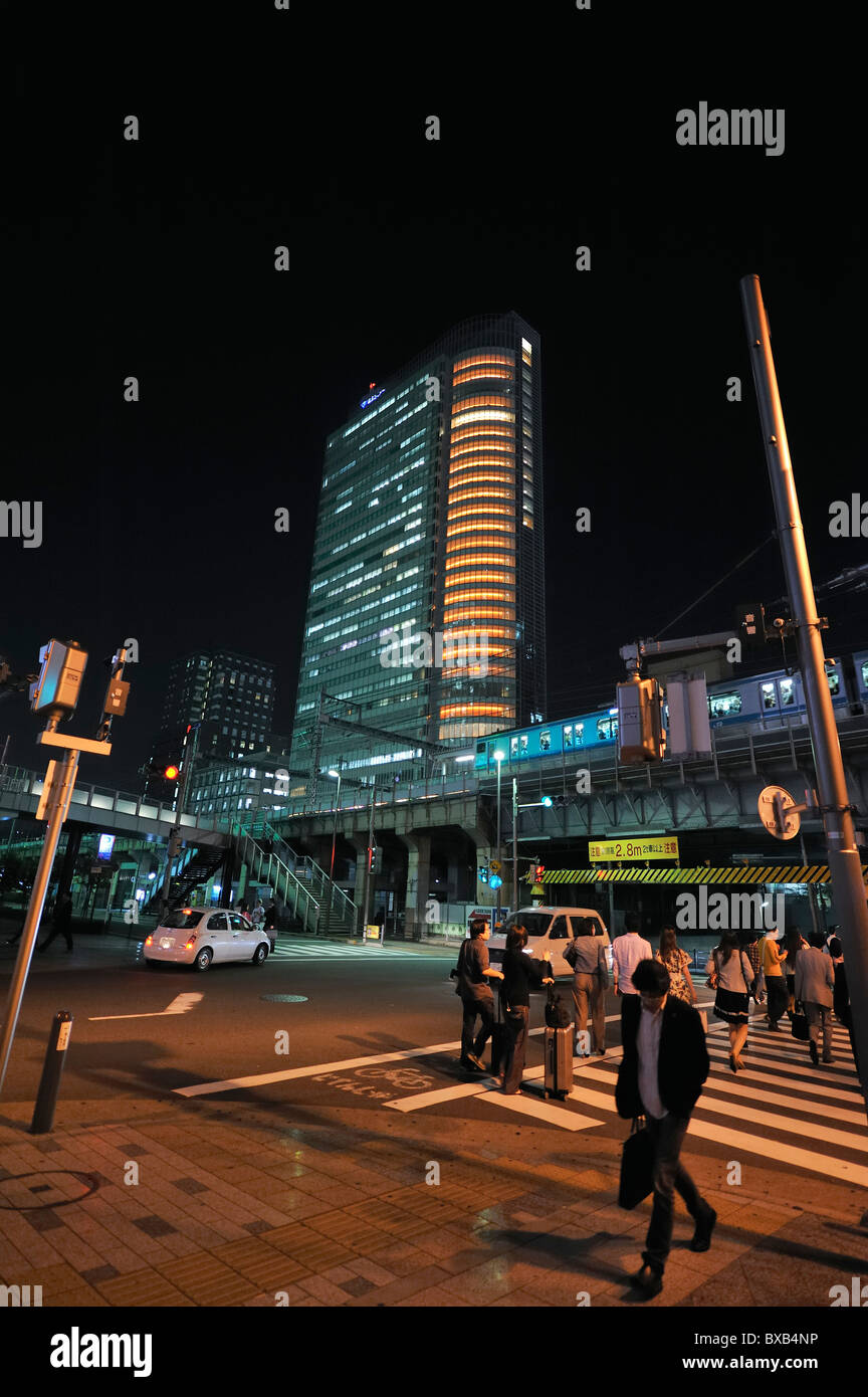Pedestrians crossing street in Akihabara at night, Tokyo, Japan Stock ...