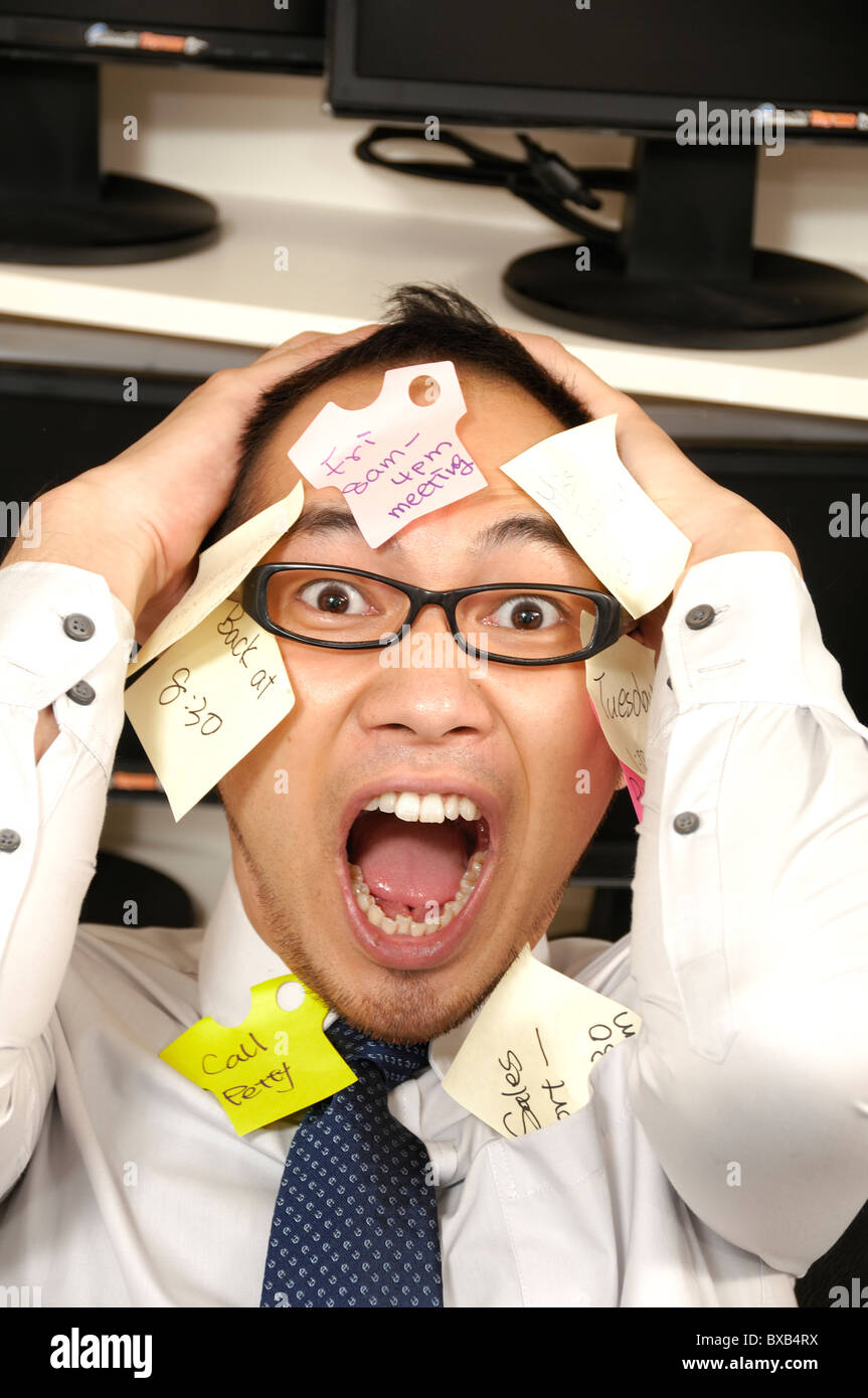 Adhesive notes stuck on a businessman's face Stock Photo - Alamy