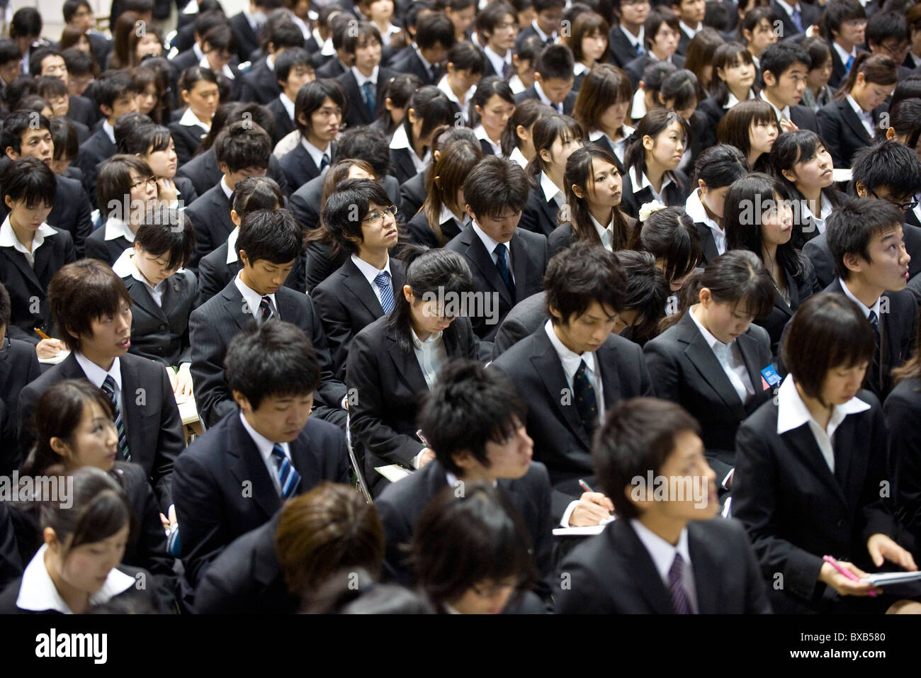New graduates are among the job hunters attending a job fair in Tokyo ...
