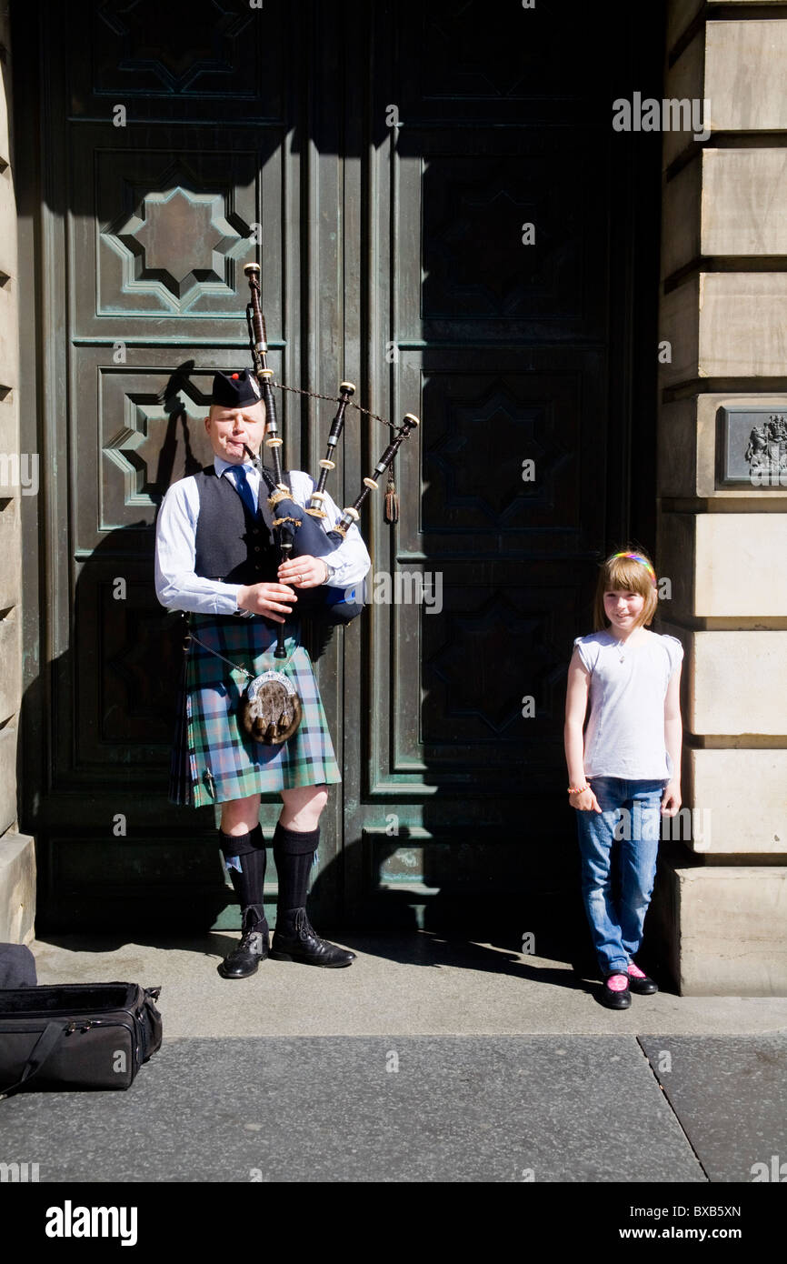 Bagpipe busker hi-res stock photography and images - Alamy