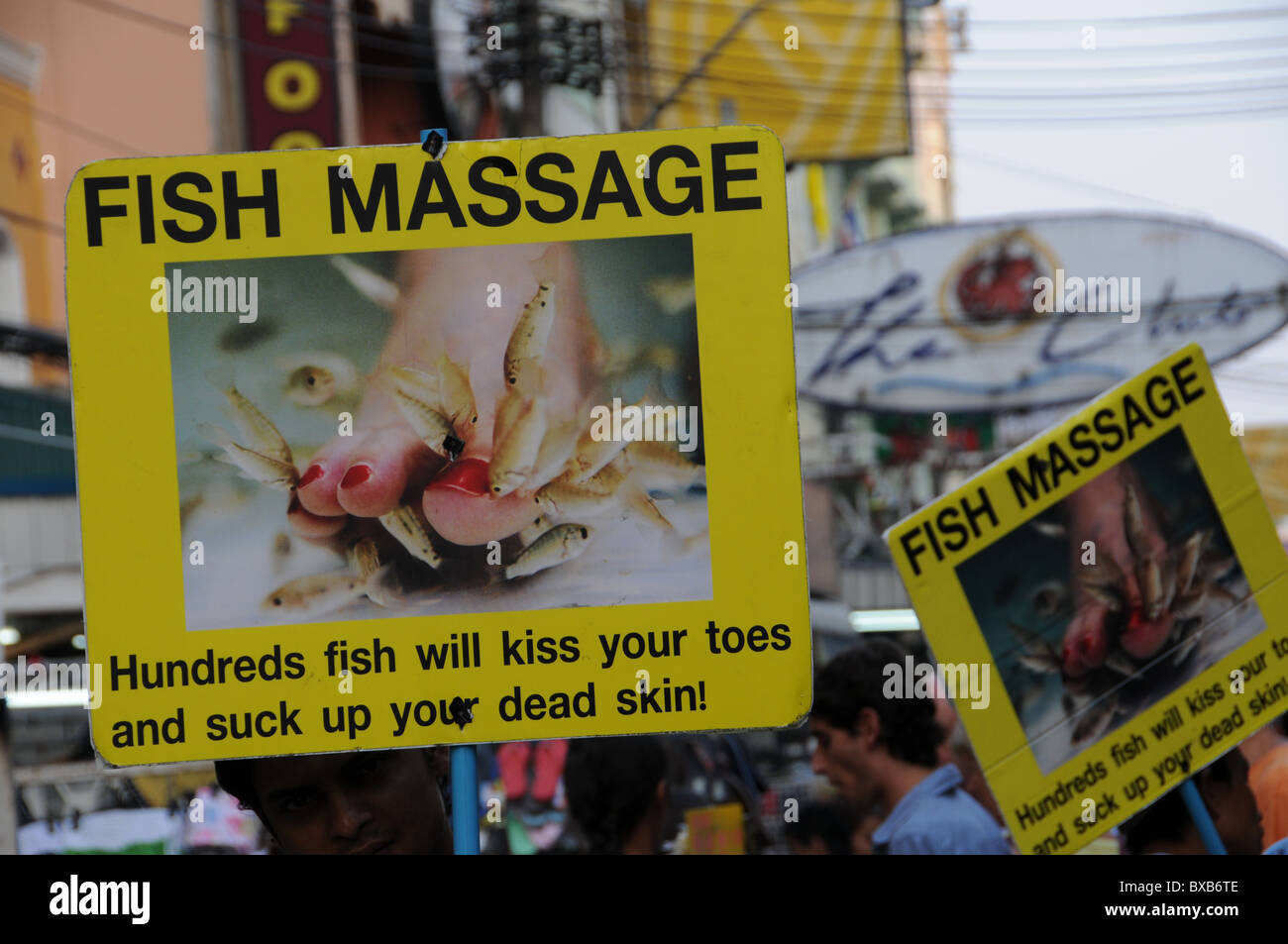 Billboard promote Fish Massage in Bangkok Stock Photo - Alamy