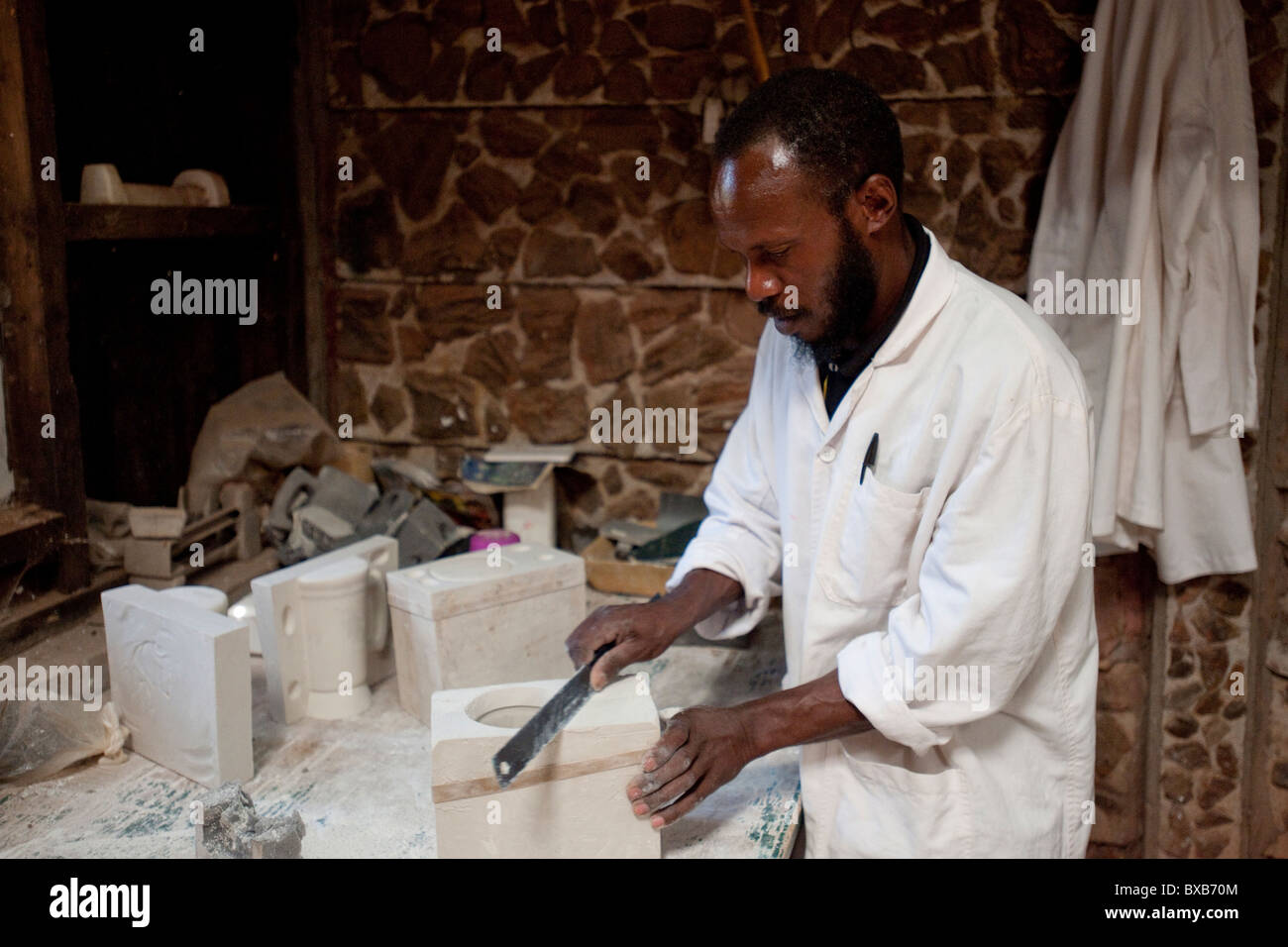African man working on crafts Stock Photo - Alamy