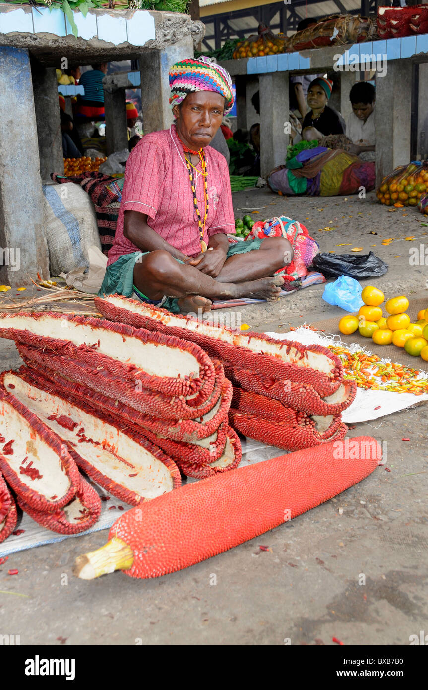 Dani woman selling Panda nuts on the market place of Wamena, Baliem ...