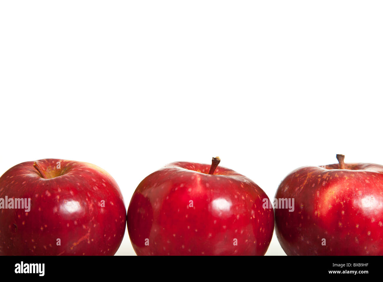 Fresh red juicy natural apples on white isolated background Stock Photo ...