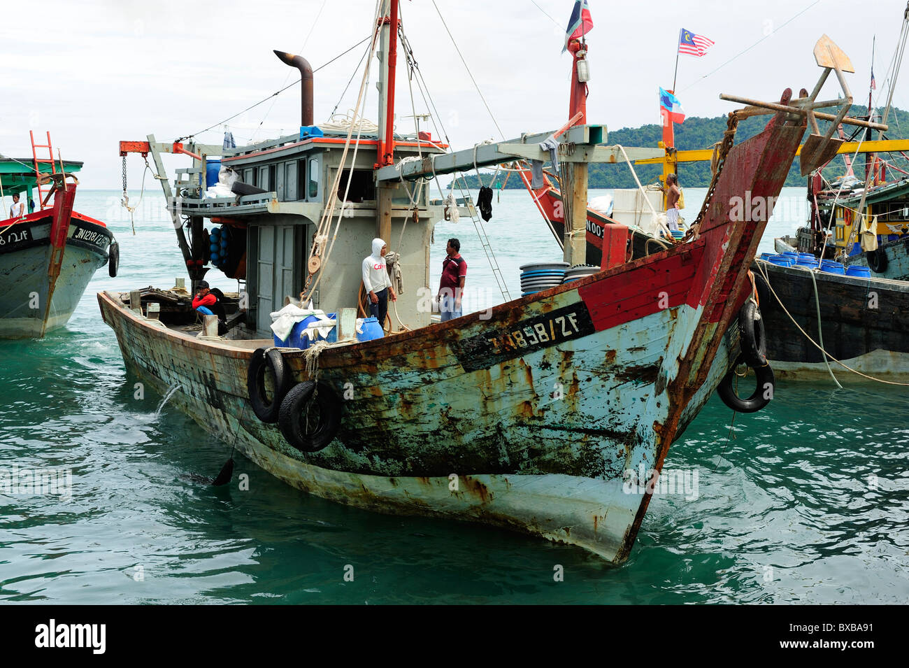 Fishing boats on waterfront in Kota Kinabalu, Sabah Stock Photo - Alamy