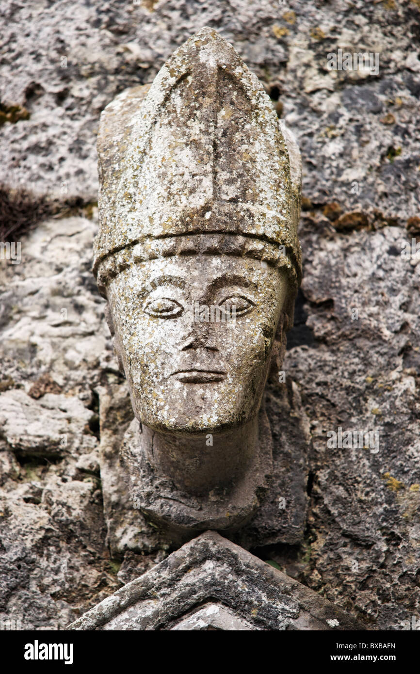 Carved Bishops head in Kilfenora Cathedral, the Burren, County Clare ...