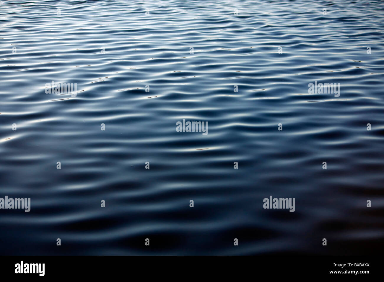 View of a part of the smooth ocean's waves Stock Photo - Alamy